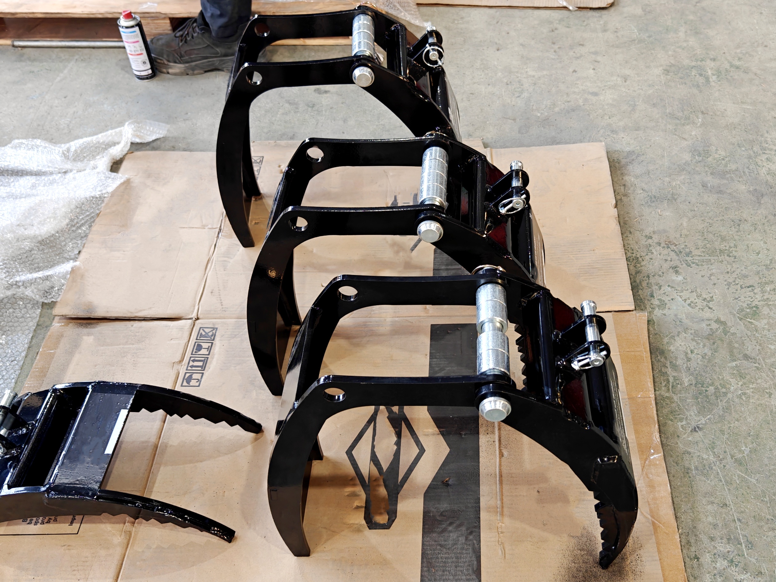 What's the use and purpose of backhoe attachment rock grabber?