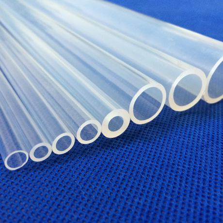 What are the commonalities and differences between PFA and PTFE?