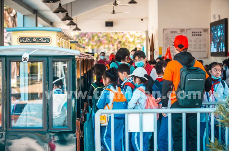 Children ride the steam locomotive train to celebrate Children's Day